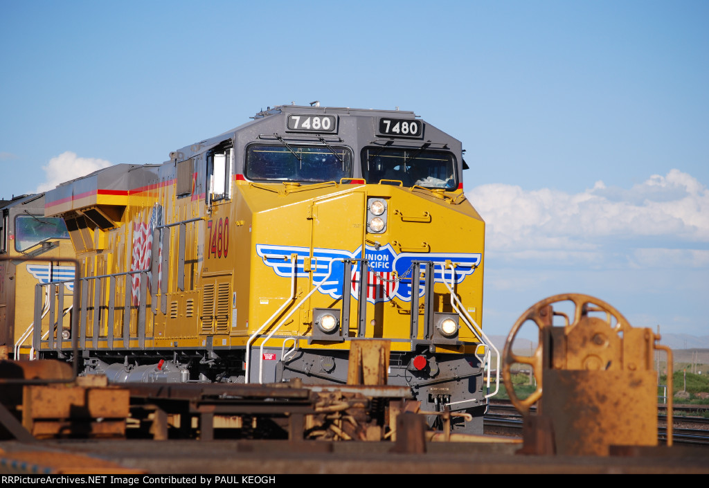 UP 7480 Full View as I took this shot over an MTy Spine Car train which was parked for fuel on ...
